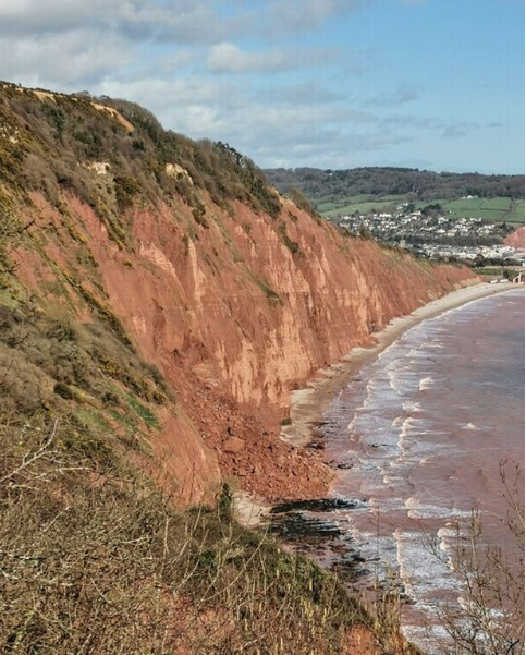 Rocks the size of cars collapse in huge Sidmouth cliff fall | East ...